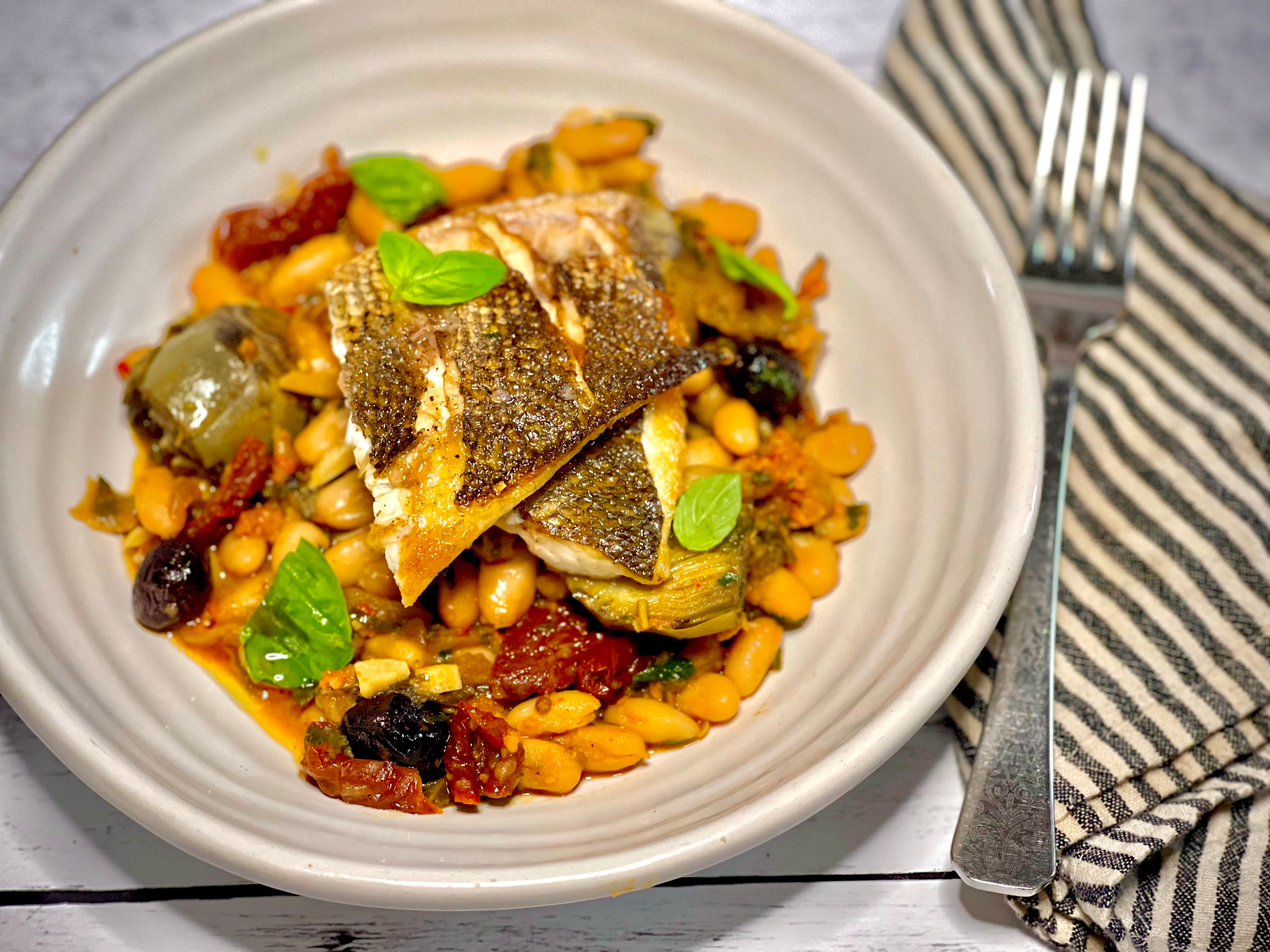 Crispy Skin Branzino with Cannellini Beans Ragout — Sogno Toscano