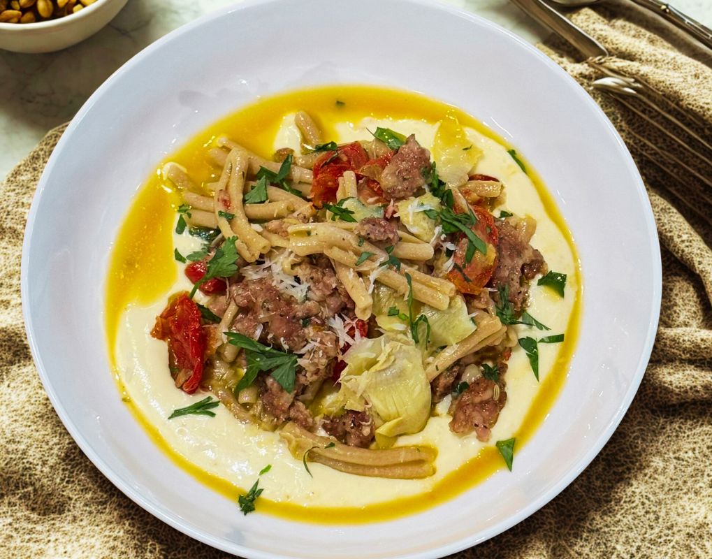 Strozzapreti with Sausage, Sun-Dried Tomatoes, and Artichokes in Goat ...